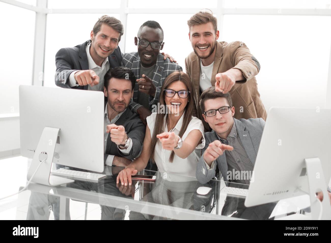 happy business team pointing at you Stock Photo - Alamy