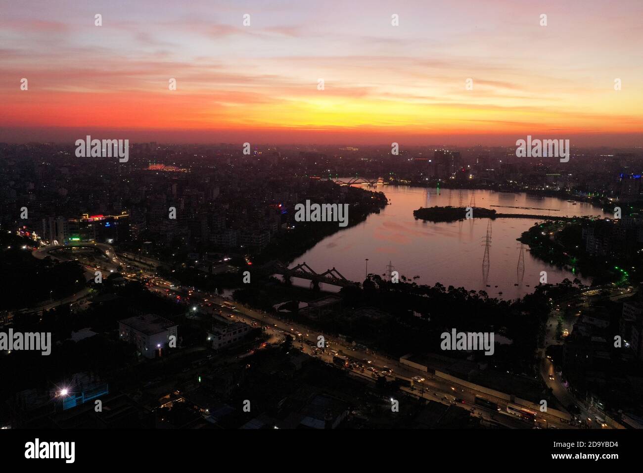 Dhaka, Bangladesh - October 30, 2020: The beautiful colors Sunset sky at Hatirjheel in Dhaka ...