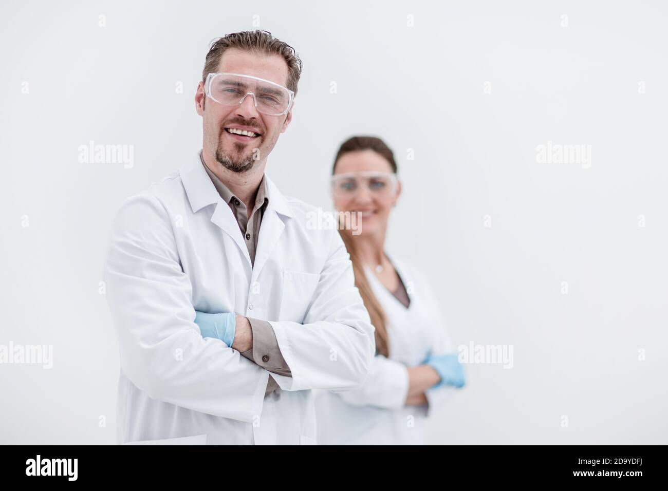 portrait of two successful researchers standing together Stock Photo ...