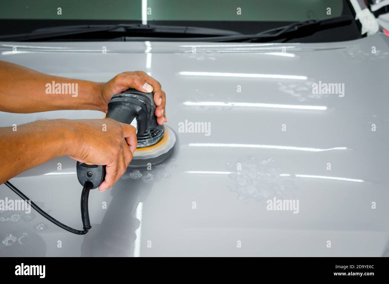 Detail: Polishing the car, preparing the car surface before coating the ...