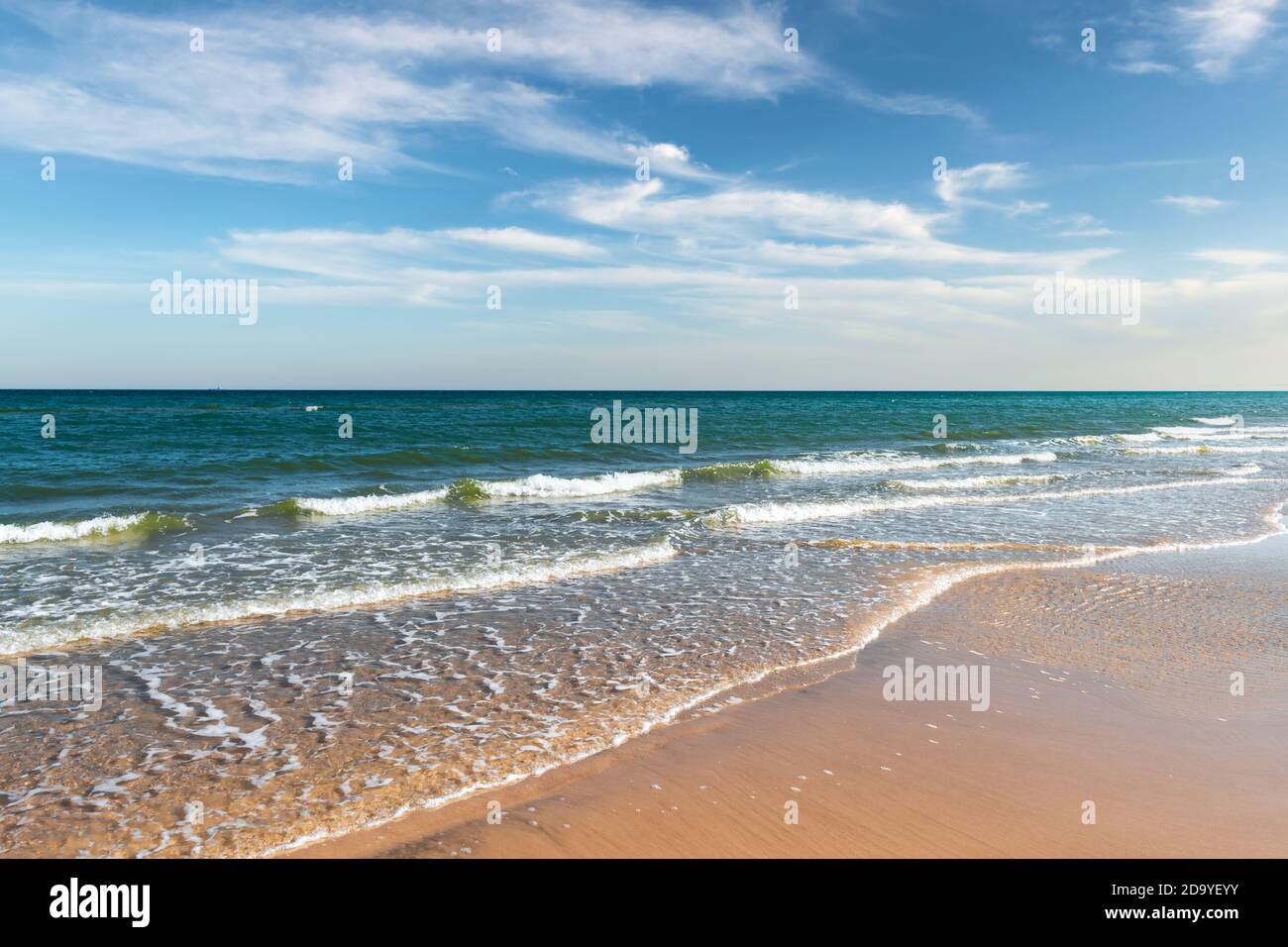 Tide waves on tropical beach sand and blue ocean water. Beauty sea ...