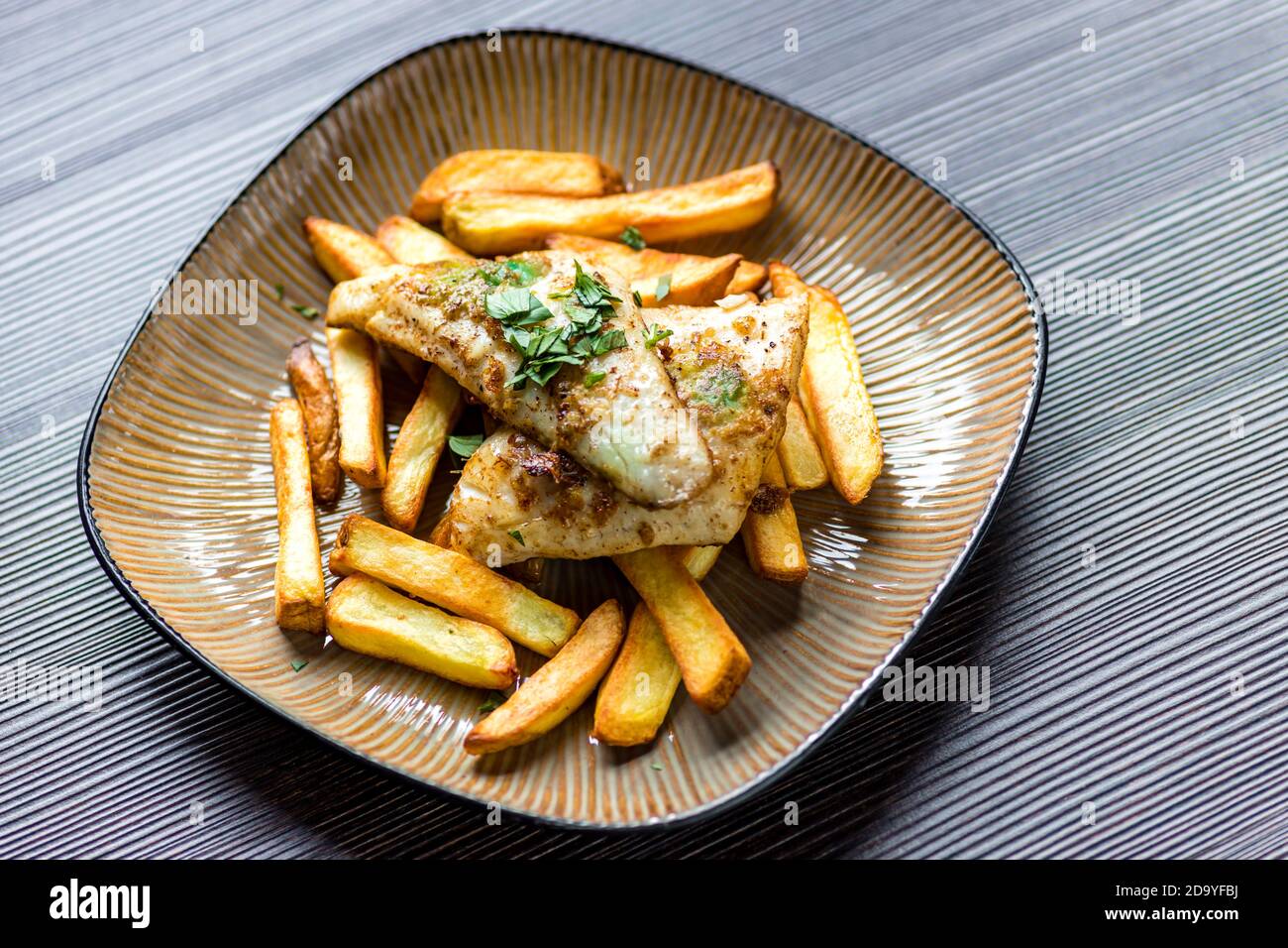 fried zander with homemade potato chips Stock Photo - Alamy