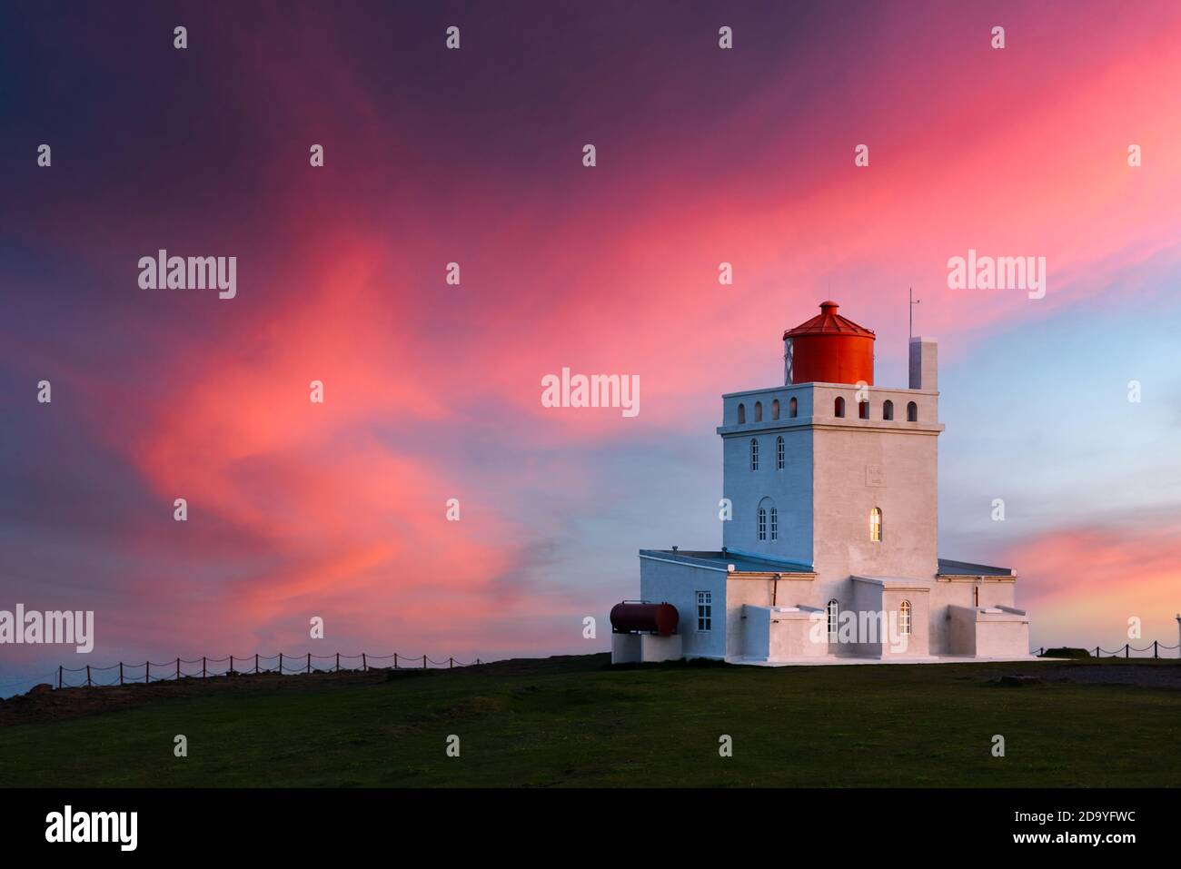 Amazing evening view of Dyrholaey Lighthouse at Cape Dyrholaey, south ...