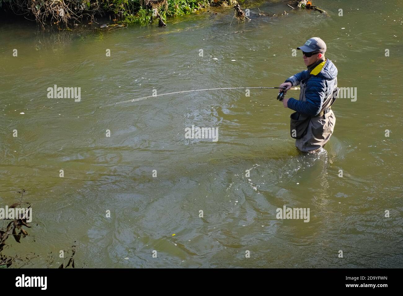 A man fishing in the river Ivel in Biggleswade beds, England Stock ...