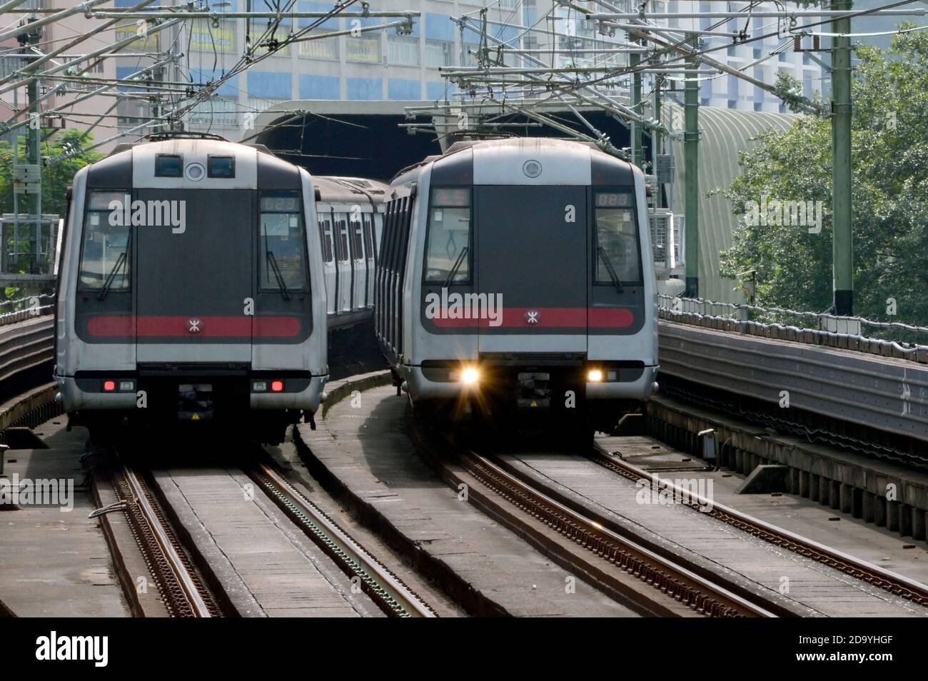 Two MTR trains passing near Kwai Hing Station, Hong Kong Stock Photo ...