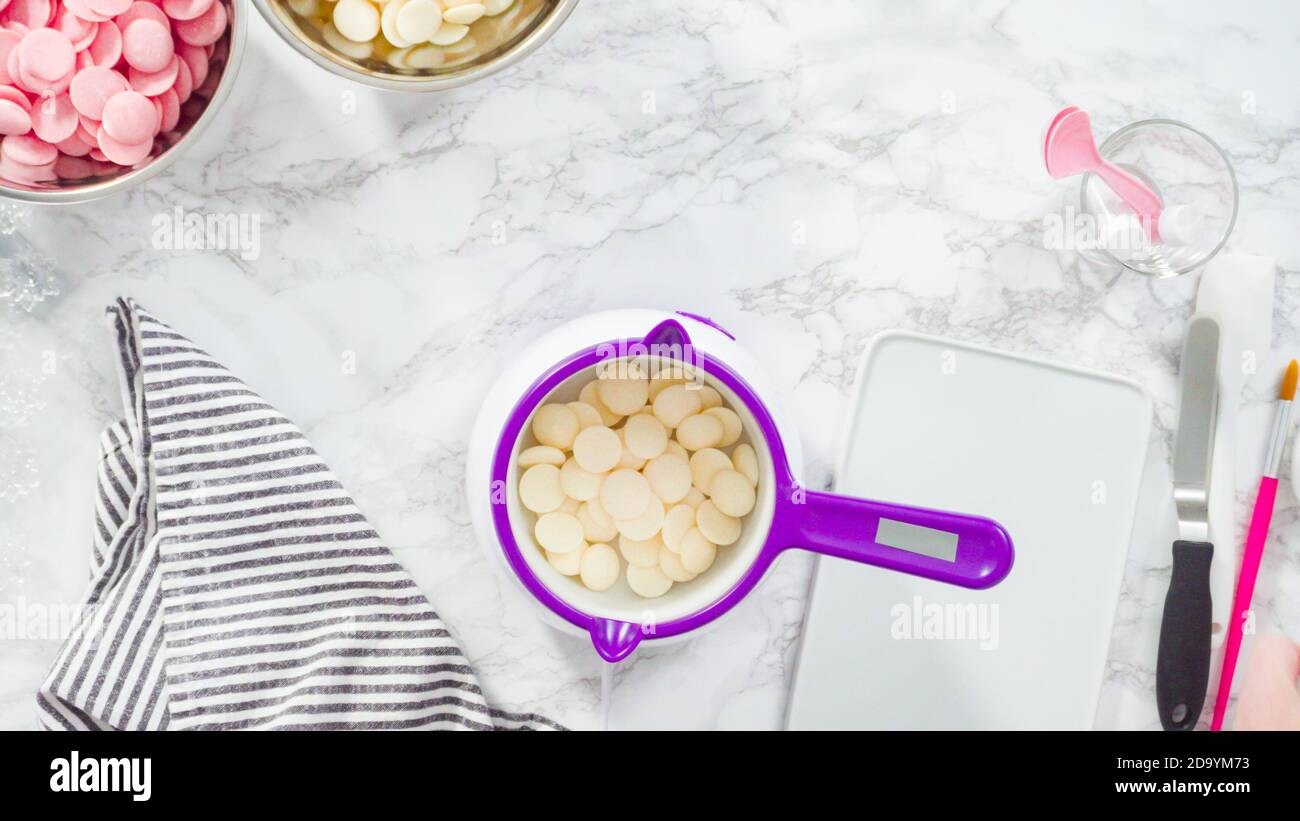 Flat lay. Step by step. Melting chocolate candy melts in an electric ...