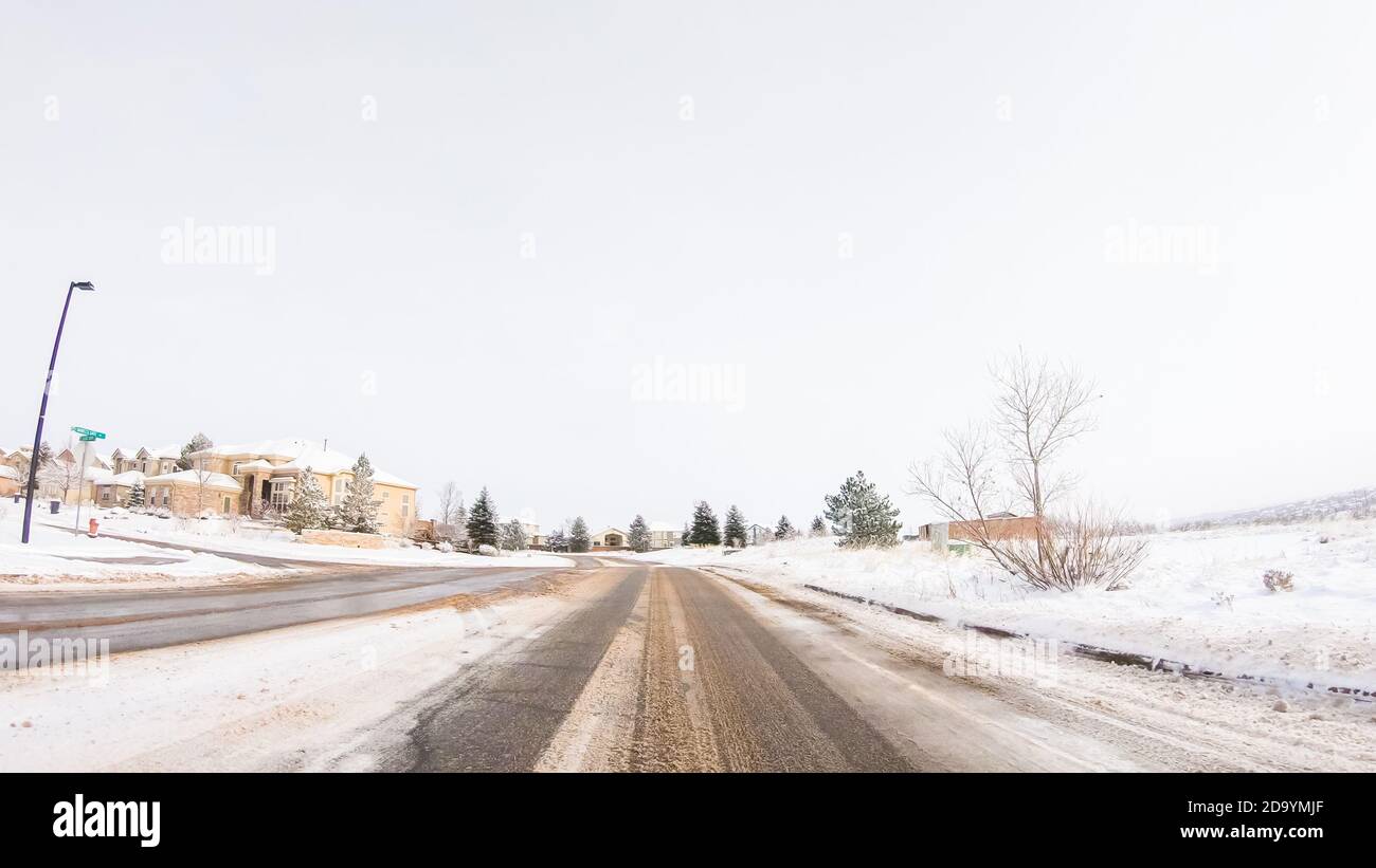 Driving on typical paved roads in a suburban upscale residential ...