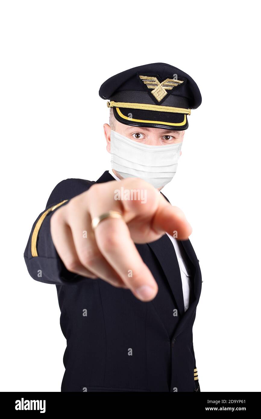 captain in the uniform in the mask points his finger Stock Photo - Alamy