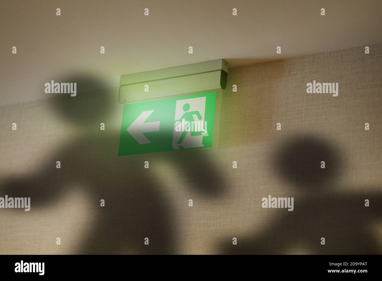 emergency exit sign and fire in the building Stock Photo - Alamy