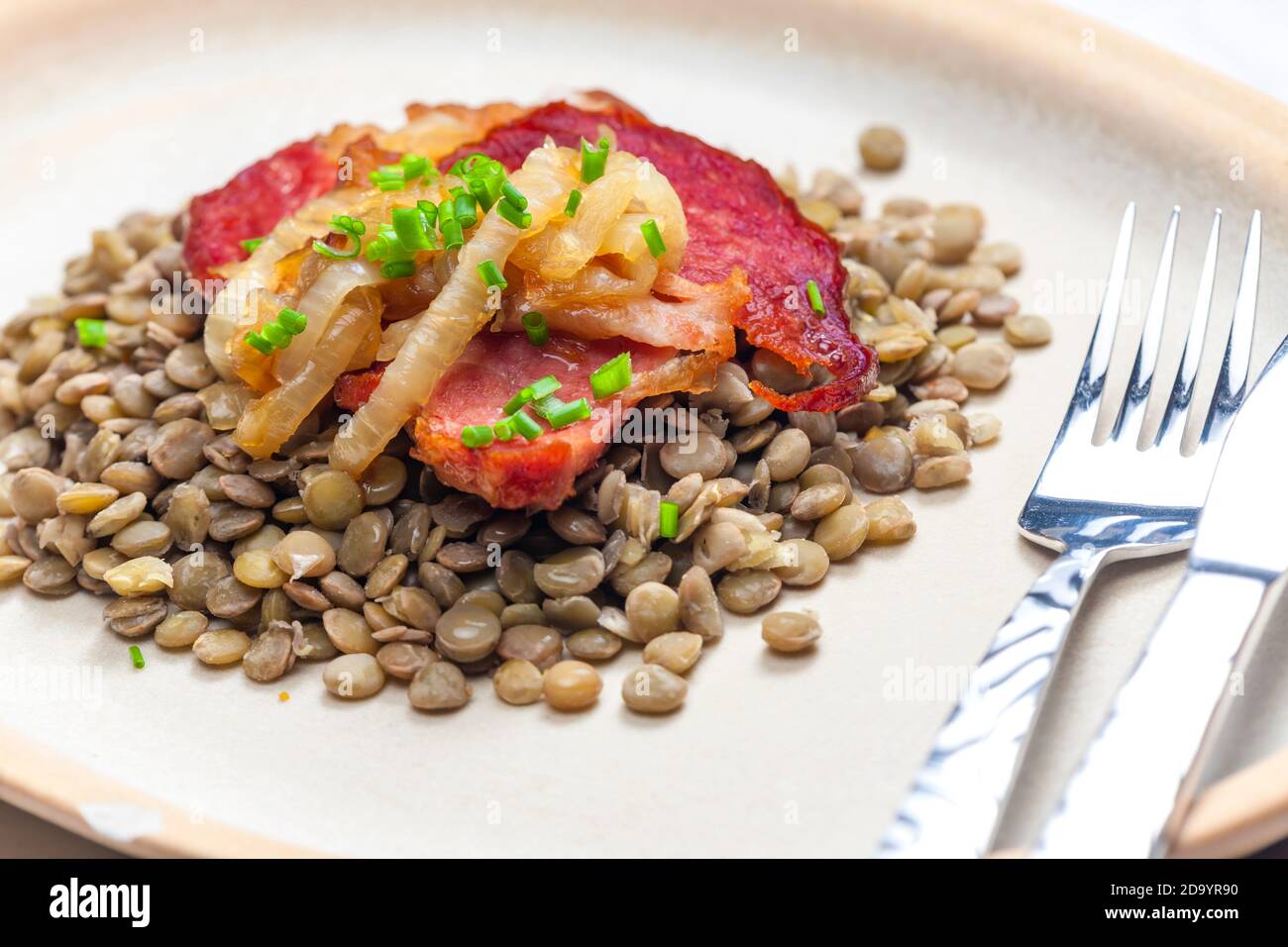 smoked meat with lentils and onion Stock Photo - Alamy