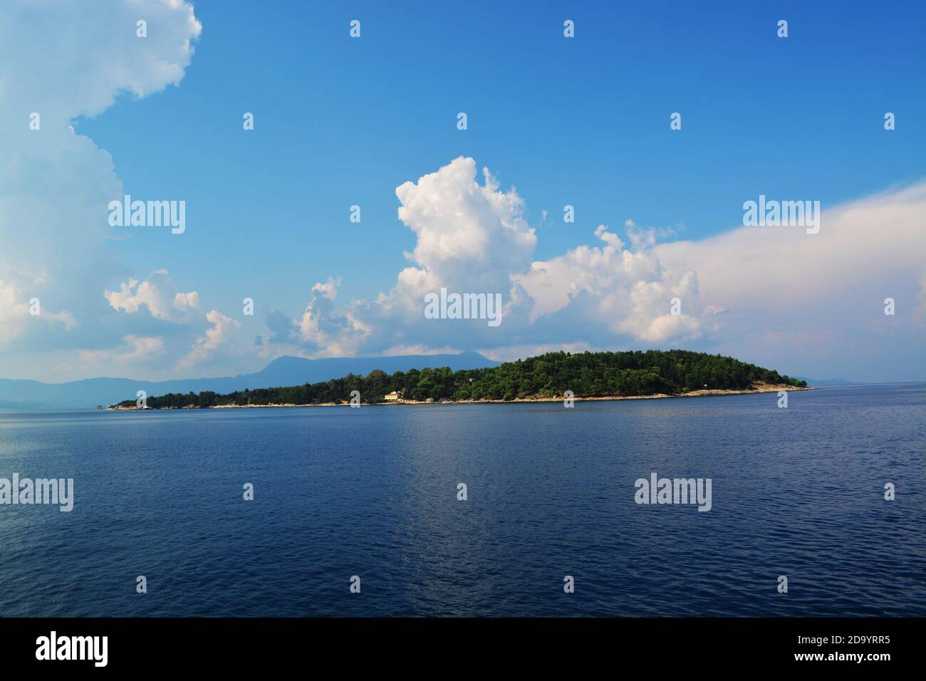 Breathtaking view of a seascape with a small island Stock Photo - Alamy