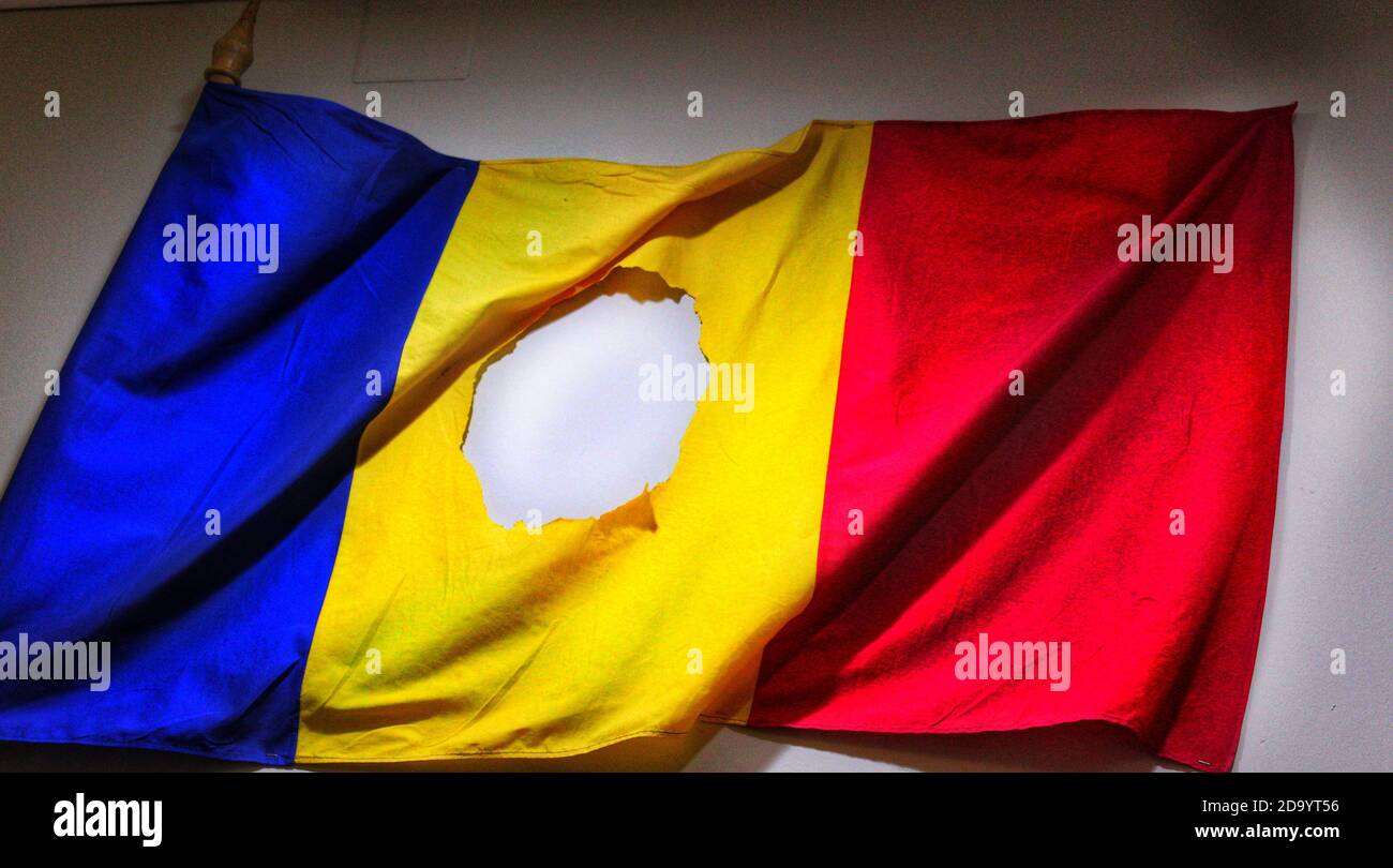 Flag of Romania with a big hole in the middle Stock Photo - Alamy