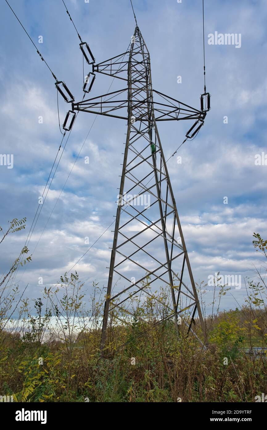 Tall high voltage electric pole in nature Stock Photo - Alamy