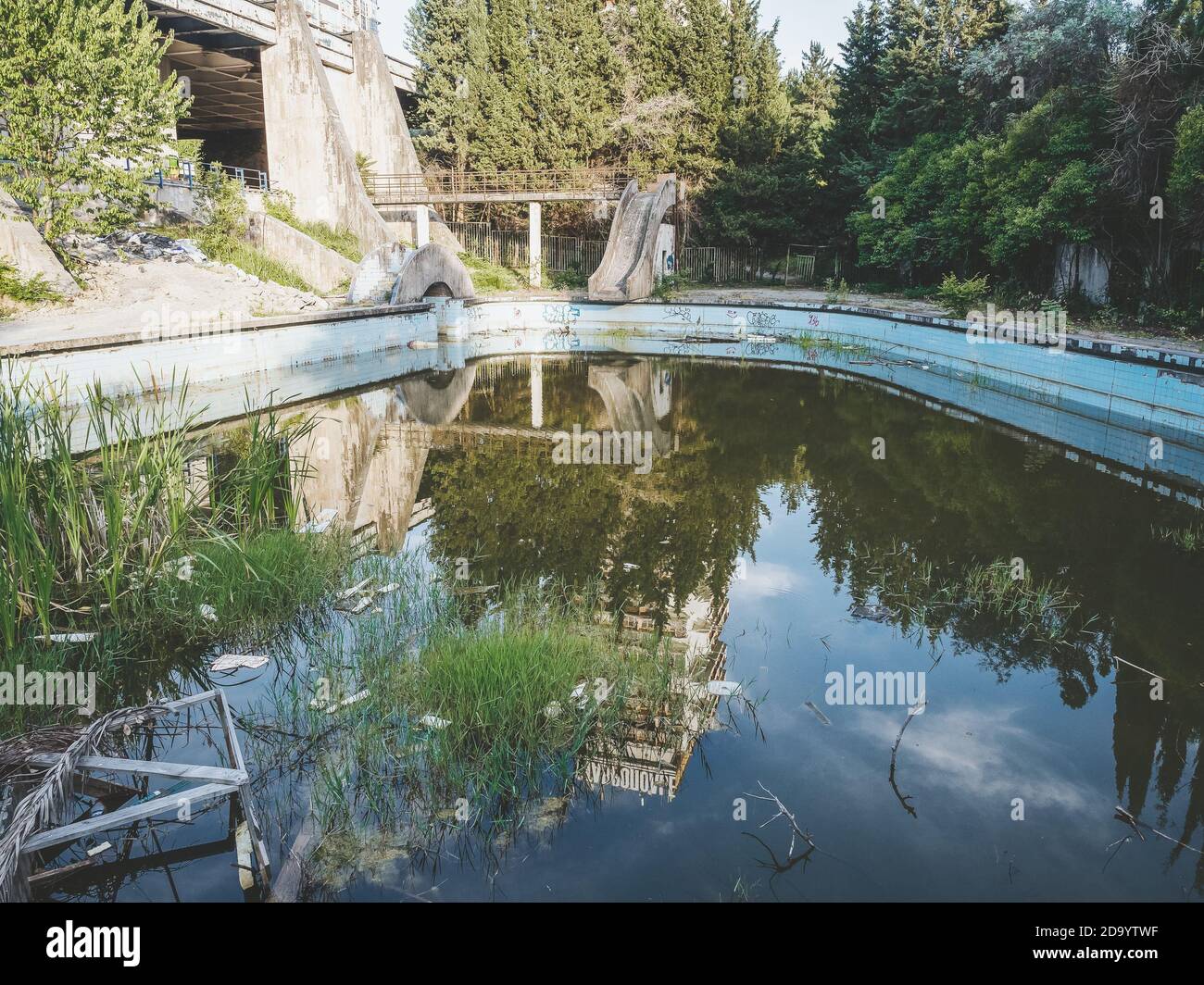 Russia, Sochi 15.06.2020. Old abandoned sanatorium outdoor pool with ...