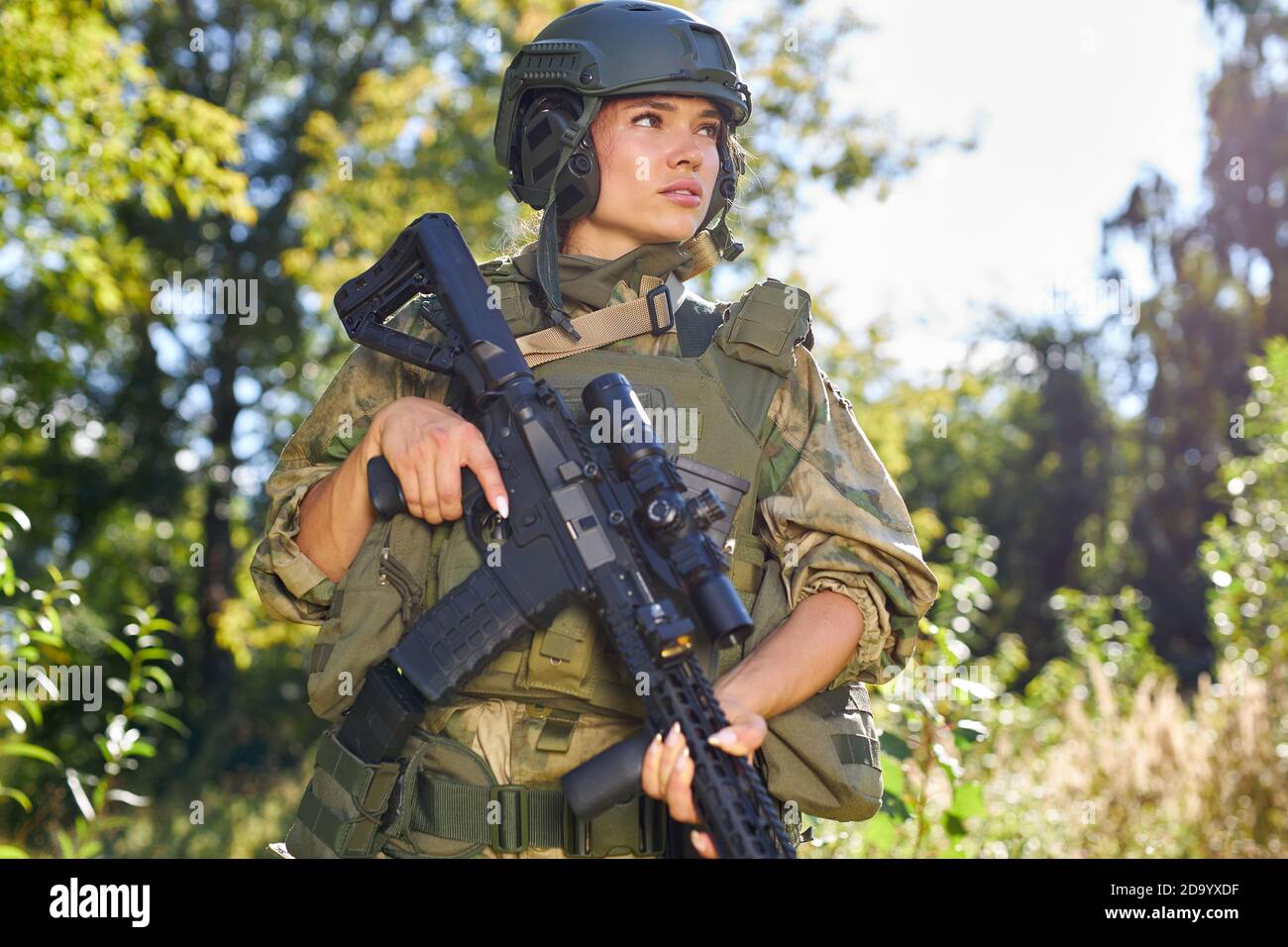 Female woman holding shotgun hi-res stock photography and images - Alamy