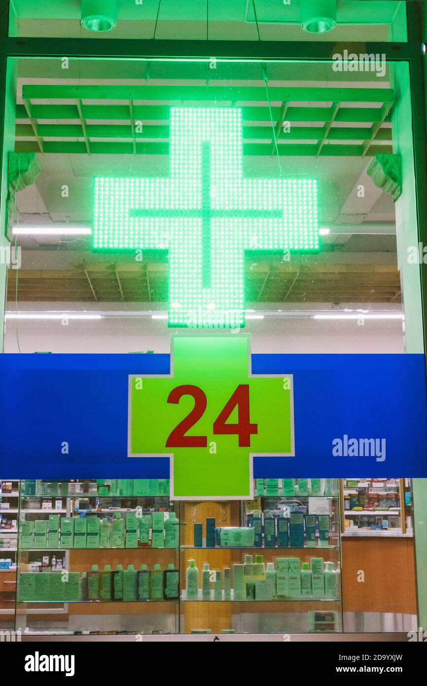 Pharmacy Cross 24 Hours Of Medication Helps Symptoms pills Stock Photo ...