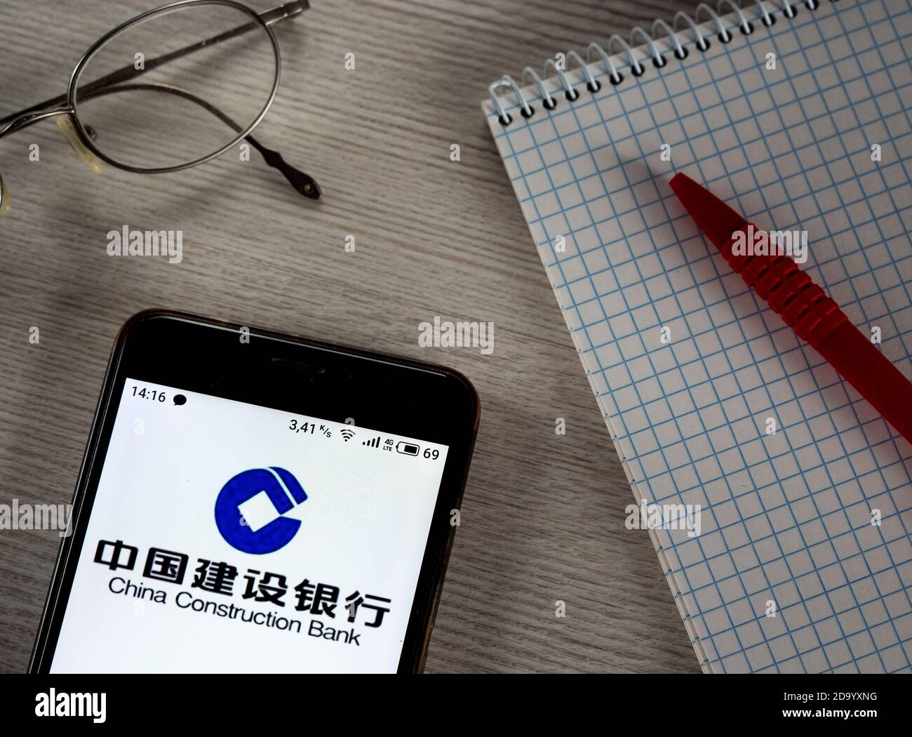 In this photo illustration a China Constructoin Bank logo is seen ...