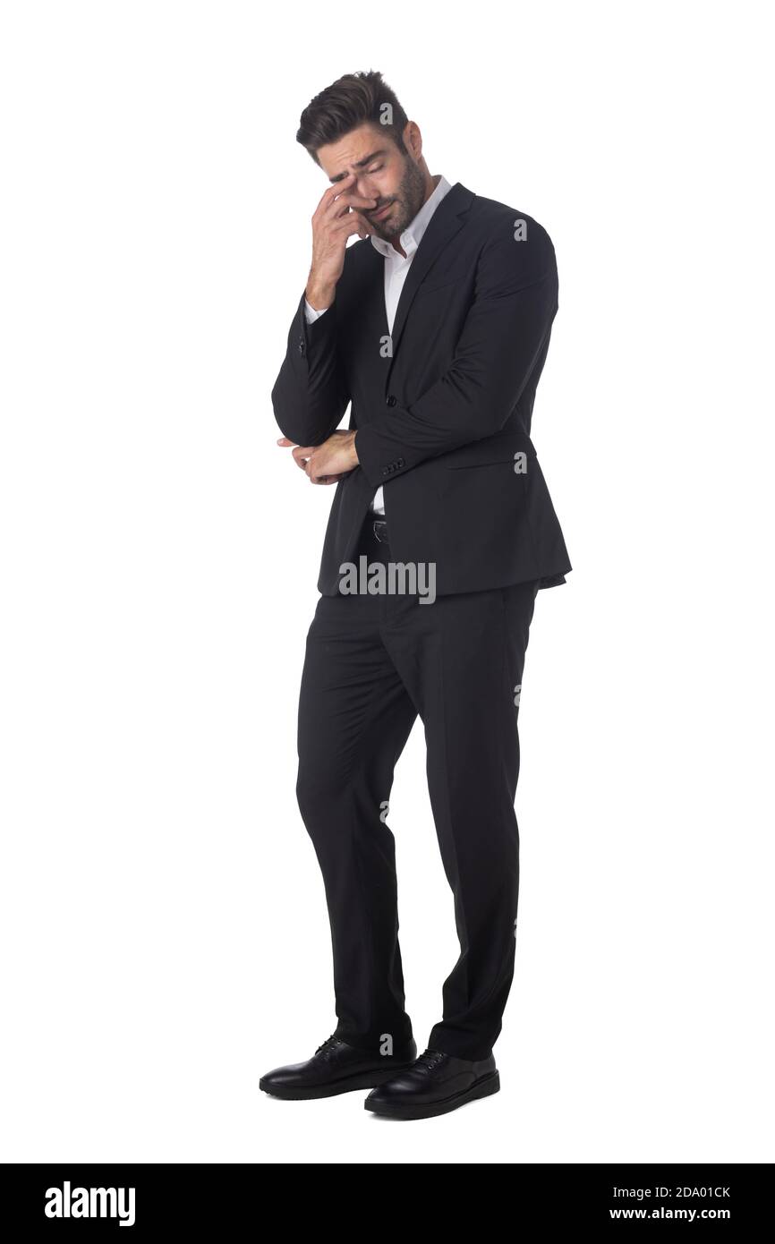 Full length portrait of young handsome business man in black suit ...