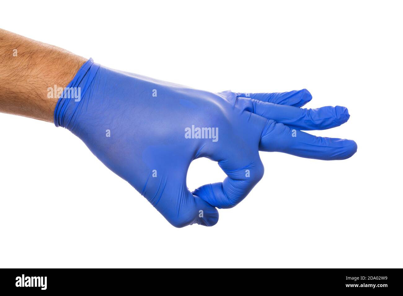 A hand in a medical glove makes a snap of the fingers, isolated on a ...