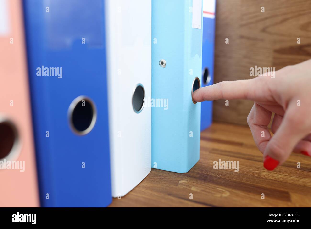 Pulling paper from file hi-res stock photography and images - Alamy