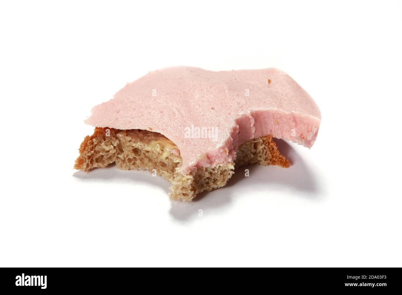 Closeup shot of a sandwich with bites taken isolated on white ...