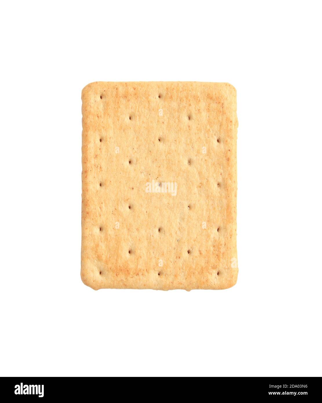 Top view closeup of a single yellow cracker with holes isolated on a ...