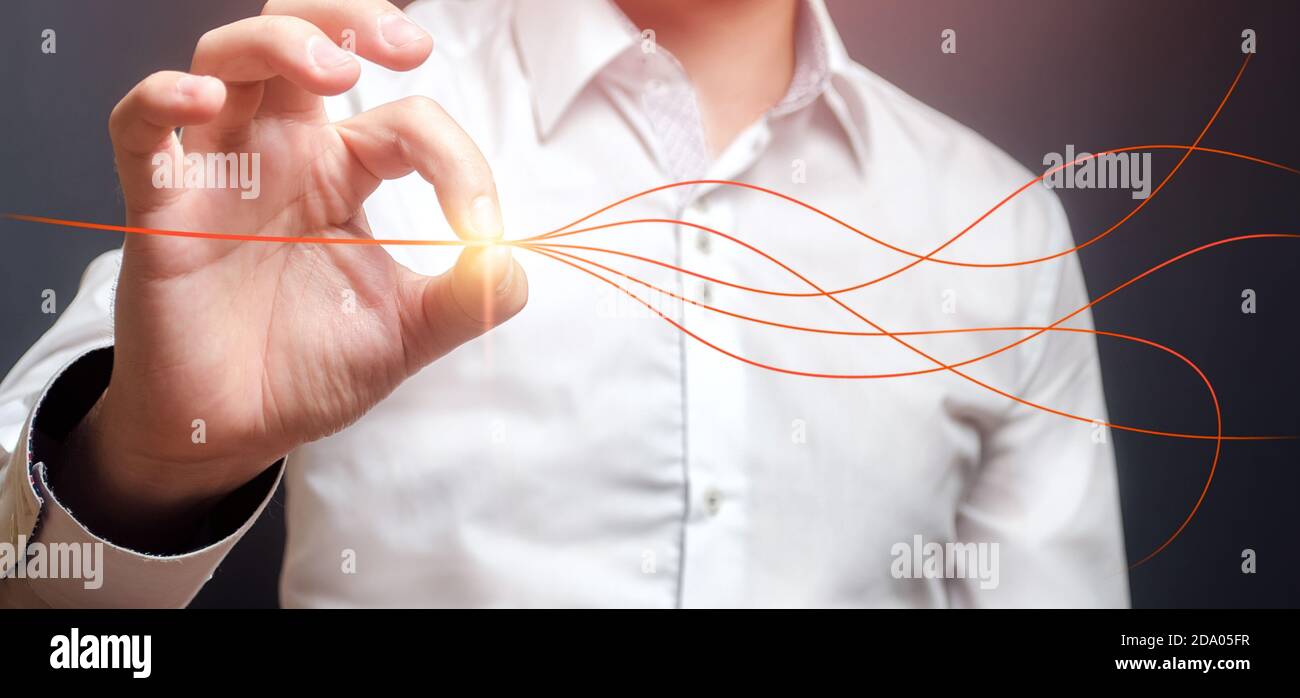 Man aligns branched lines into a single straight. Solving problems and ...