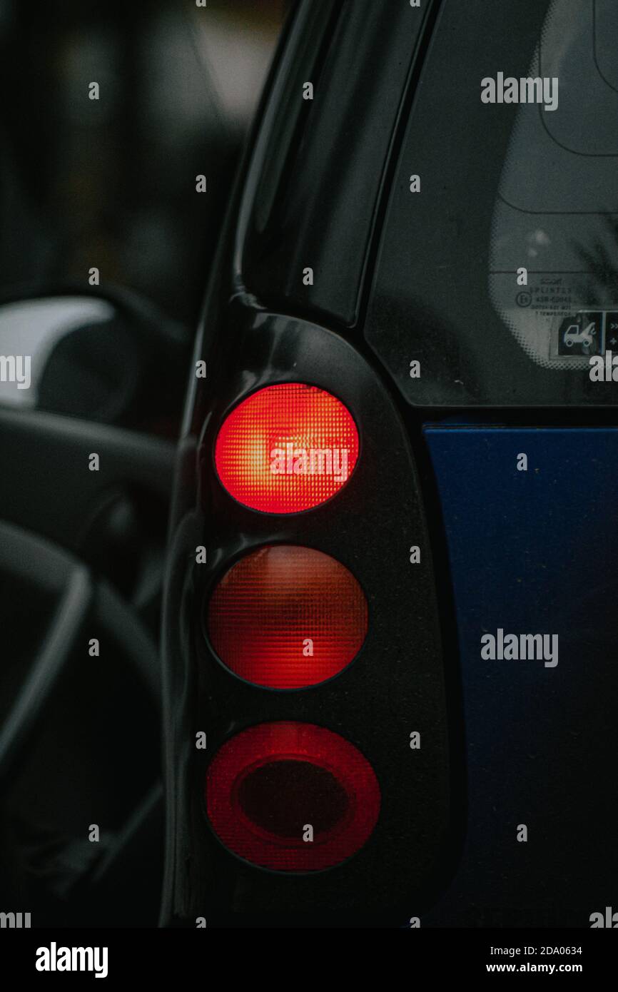 Vertical shot of lit backlight of a modern car Stock Photo - Alamy