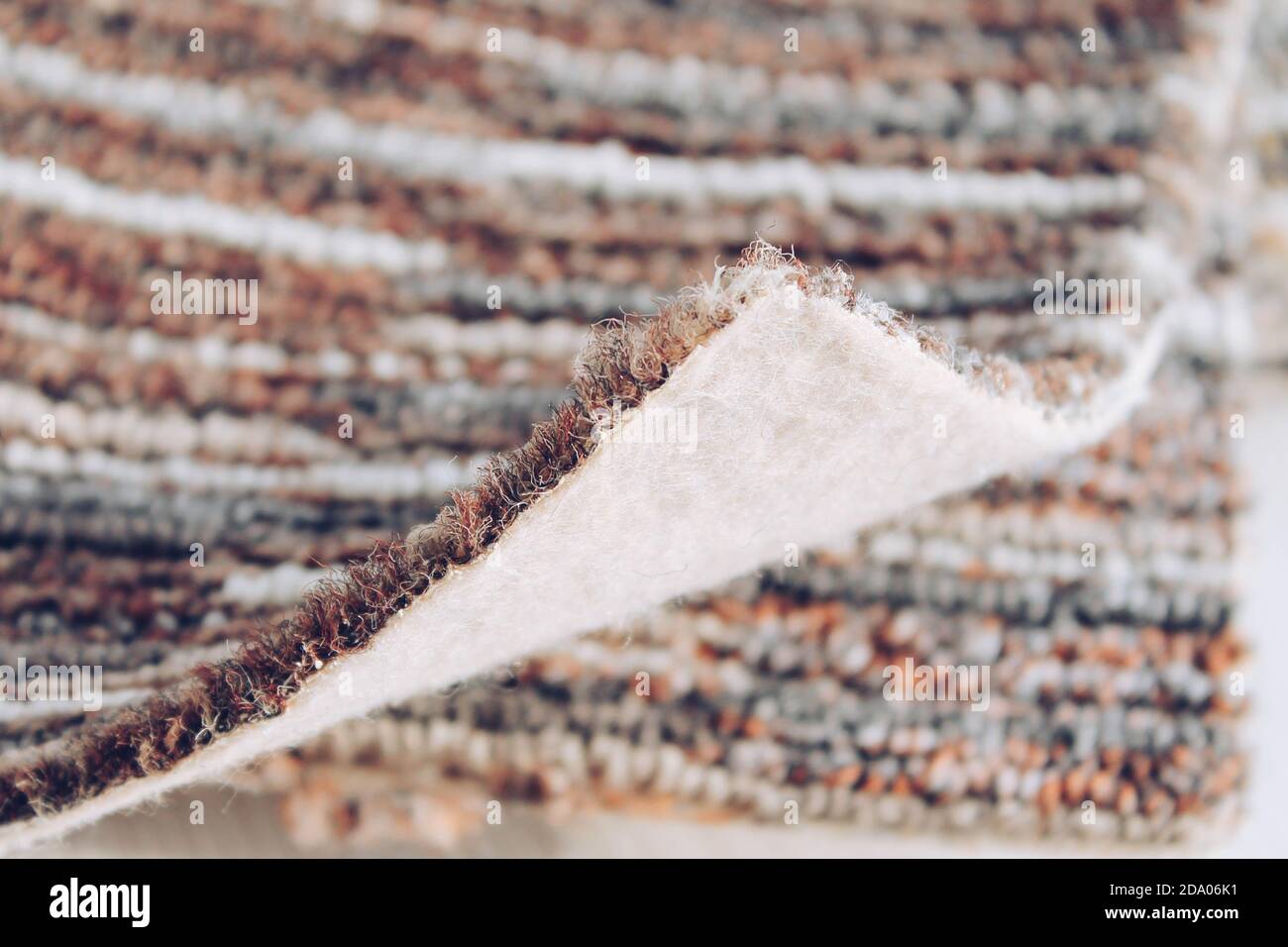 Samples of carpet bundle. Examples of multi-colored carpet in a swatch Stock Photo - Alamy