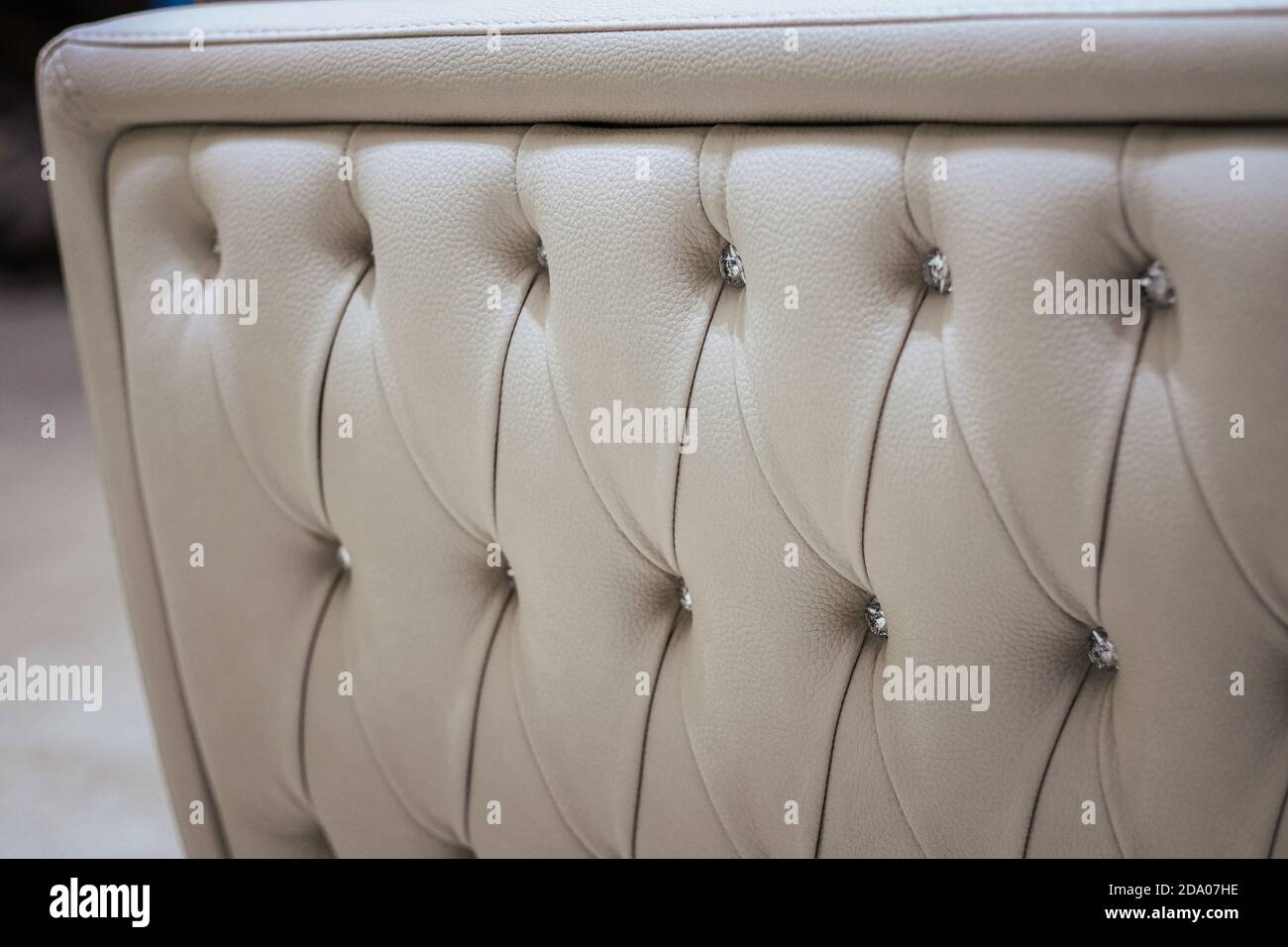 Closeup of cream colored leather furniture Stock Photo - Alamy