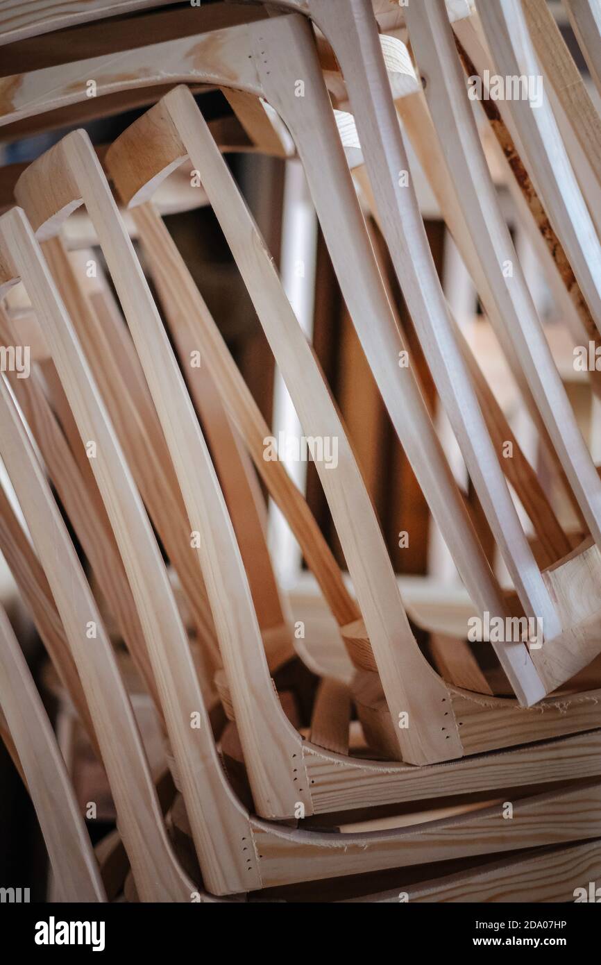 Vertical shot of wooden chair manufactory Stock Photo - Alamy