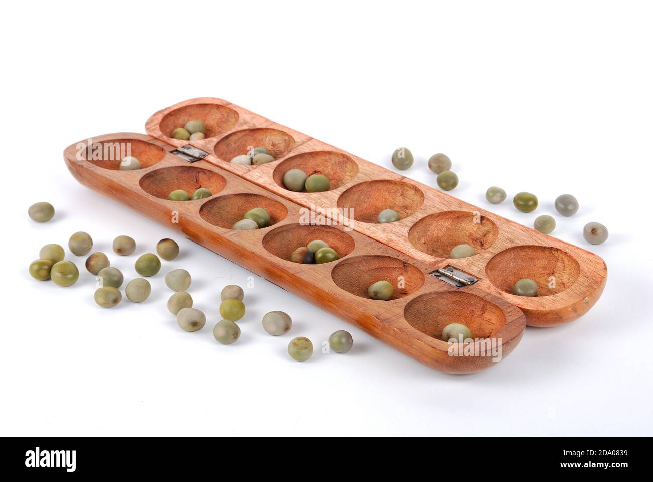 Awale - one of most ancient african game on white background Stock ...