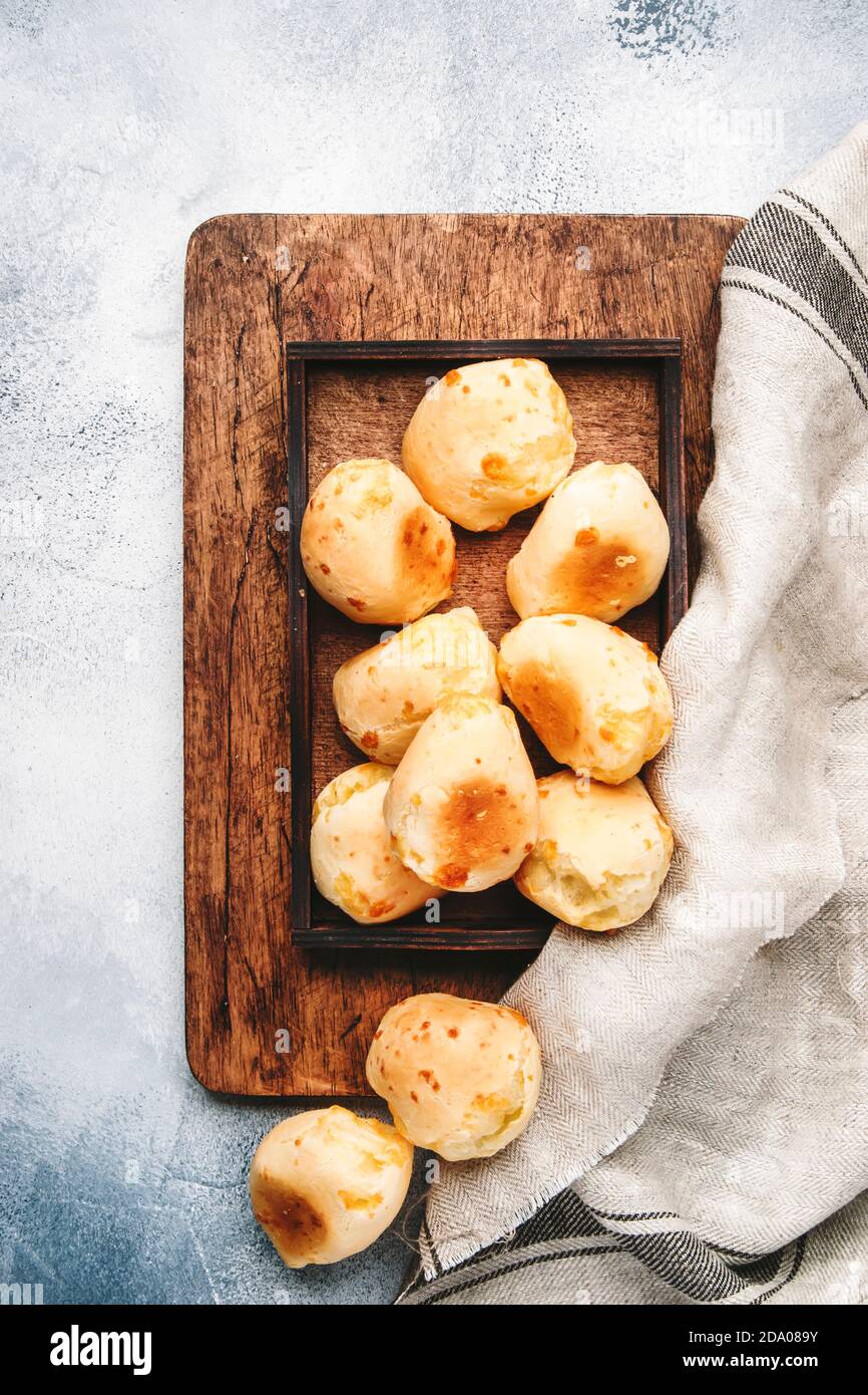 Appetizing homemade sweet buns on gray kitchen table background, top ...
