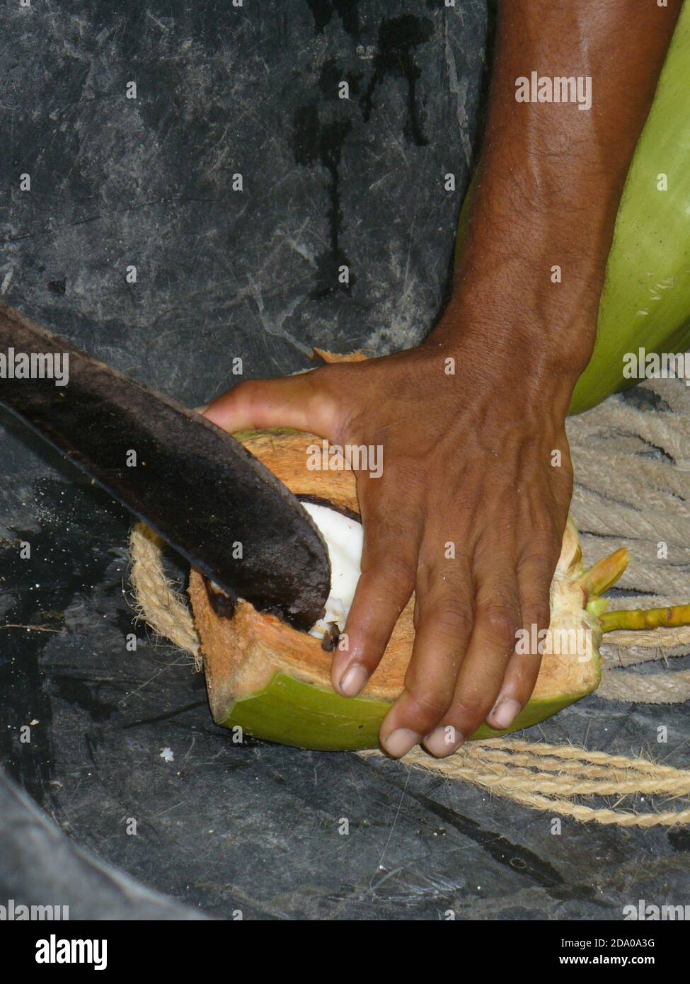 Opening coconuts hi-res stock photography and images - Alamy