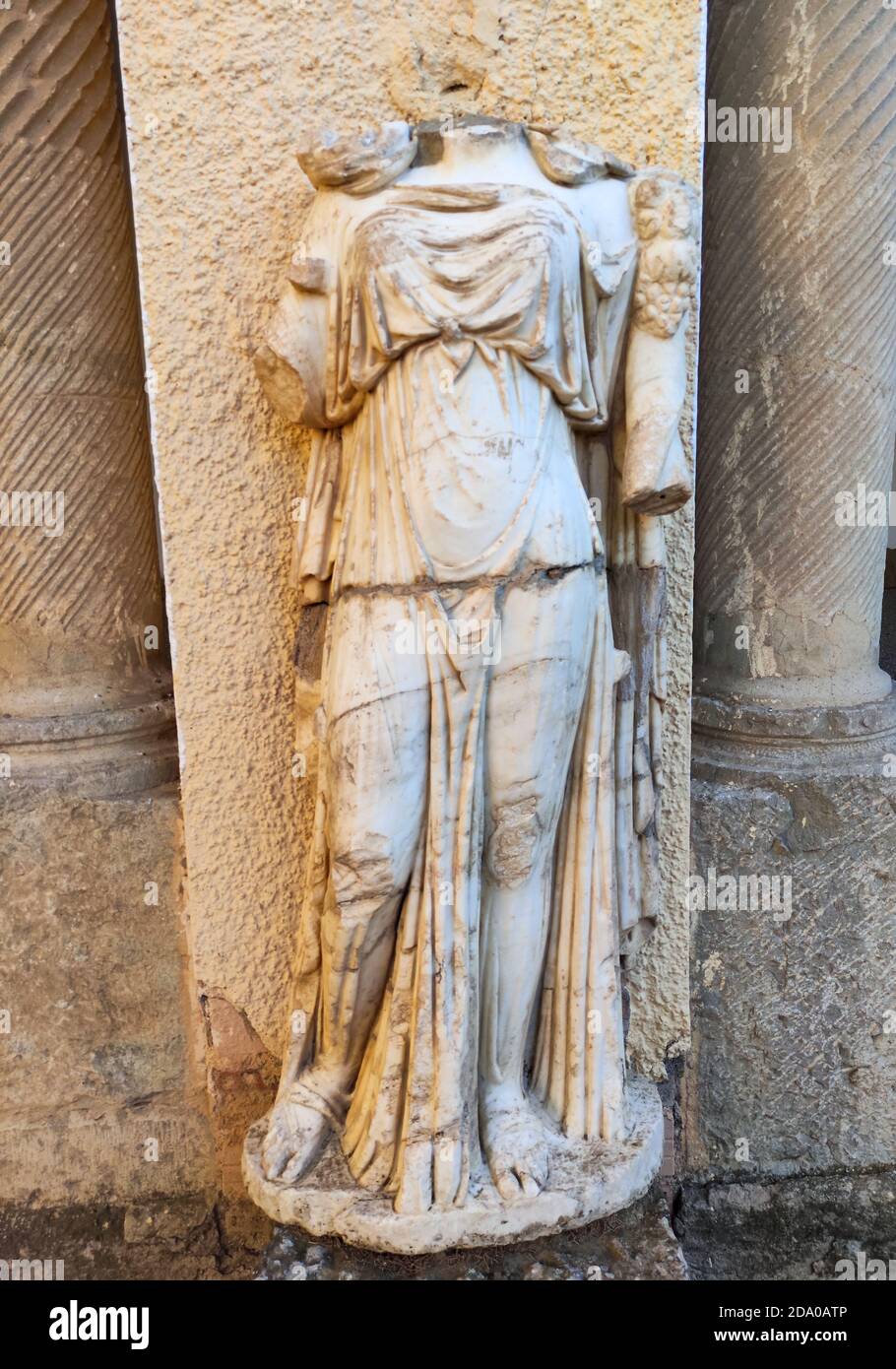 Vertical closeup of antique carved statues Stock Photo - Alamy