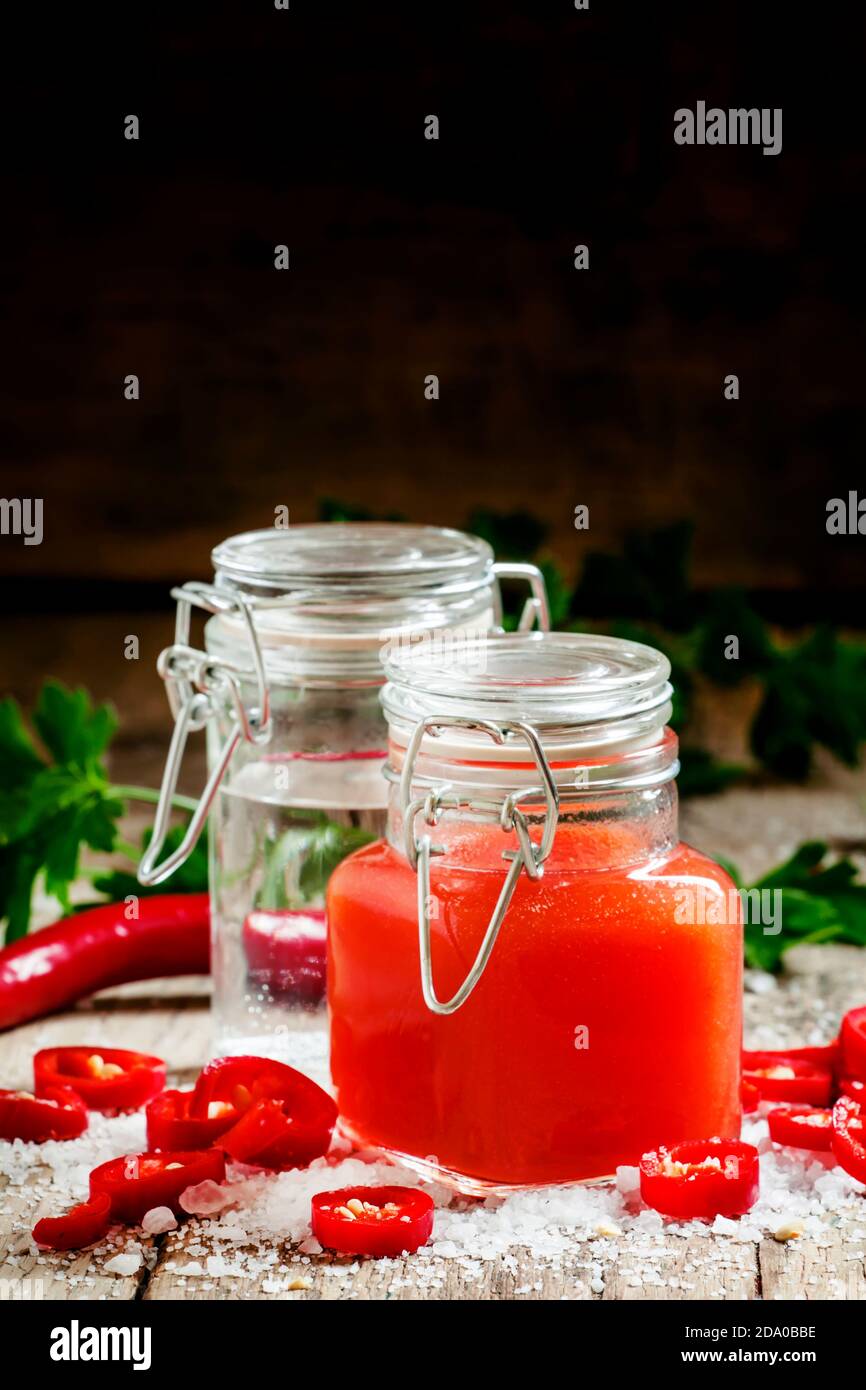 Spicy Tabasco sauce in a bottle, selective focus Stock Photo - Alamy