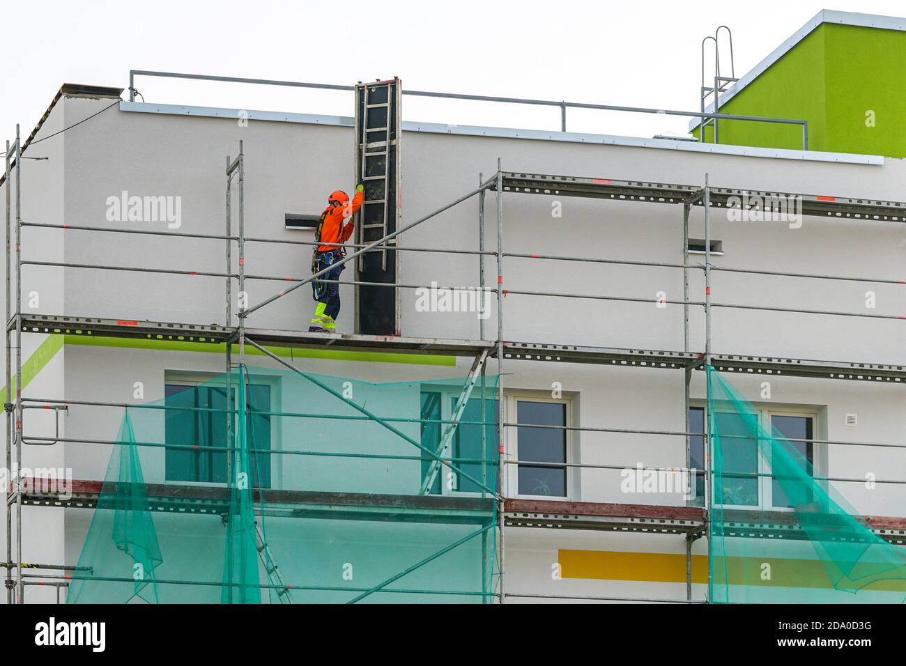 demolition of scaffolding after insulation and renovation of the ...