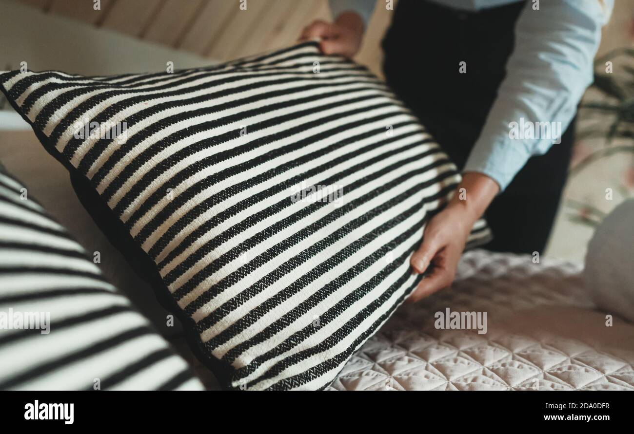 Room service. Woman making bed in hotel room Stock Photo - Alamy