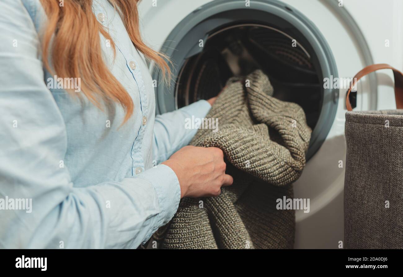 Loading wash machine hi-res stock photography and images - Alamy