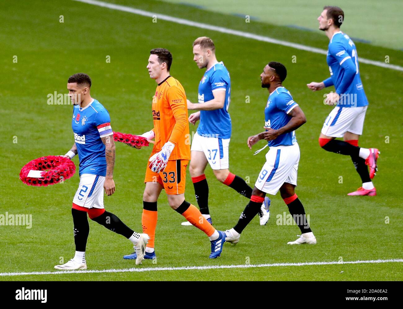 Rangers' James Tavernier (left) and goalkeeper Jon McLaughlin carry out ...