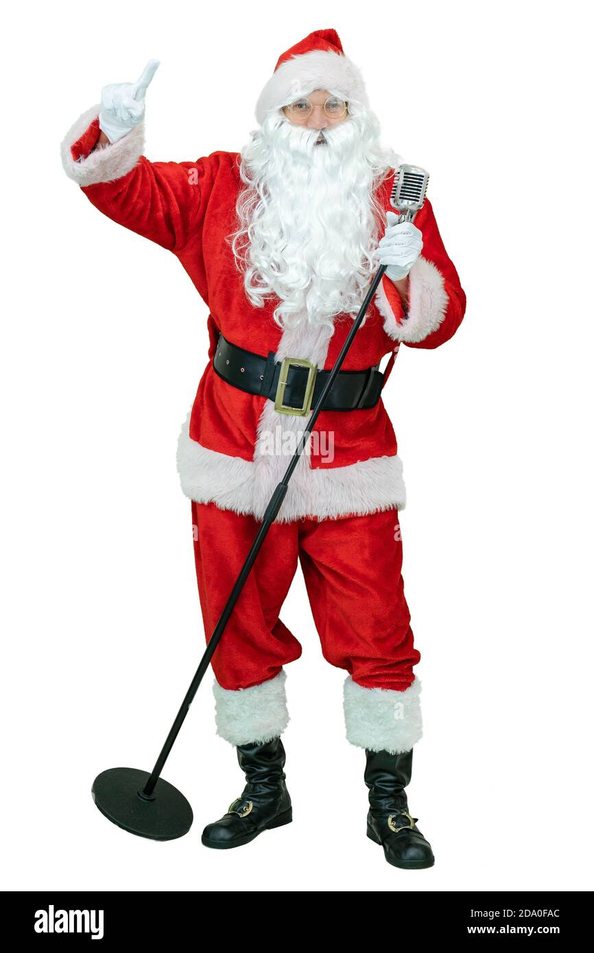 Santa holds retro microphone, sings song, shows index finger. Santa ...