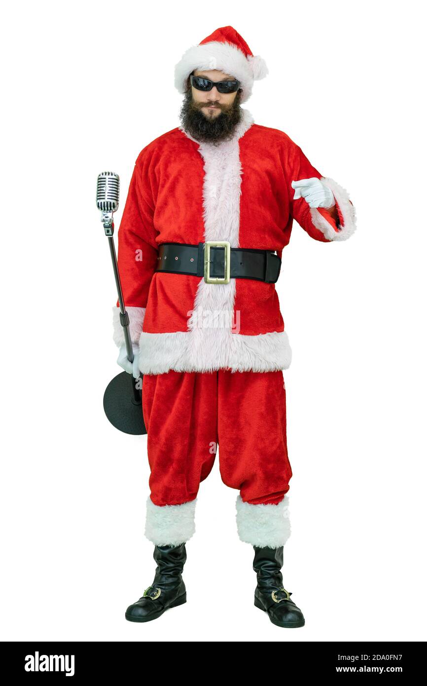 Santa Claus with retro microphone. Santa holds classic vintage ...