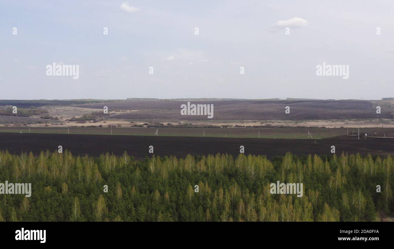Aerial survey of arable land. Plowed field. Fertile land of arable land ...
