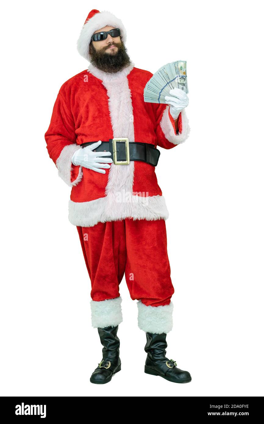 Santa holds fan of dollars money notes. Santa Claus is holding dollar ...