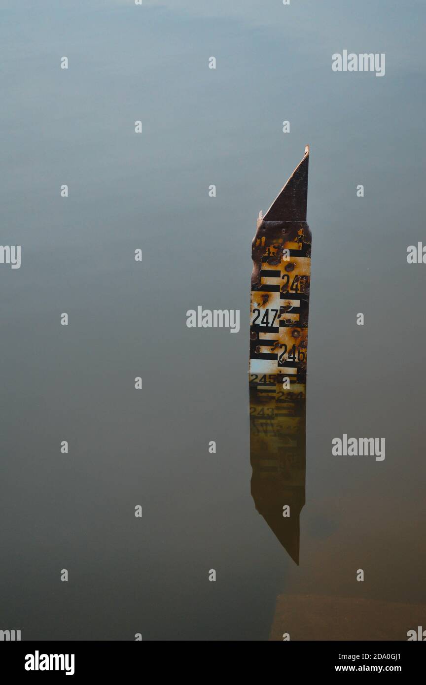 Closeup of a weathered water level indicator at a dam Stock Photo - Alamy