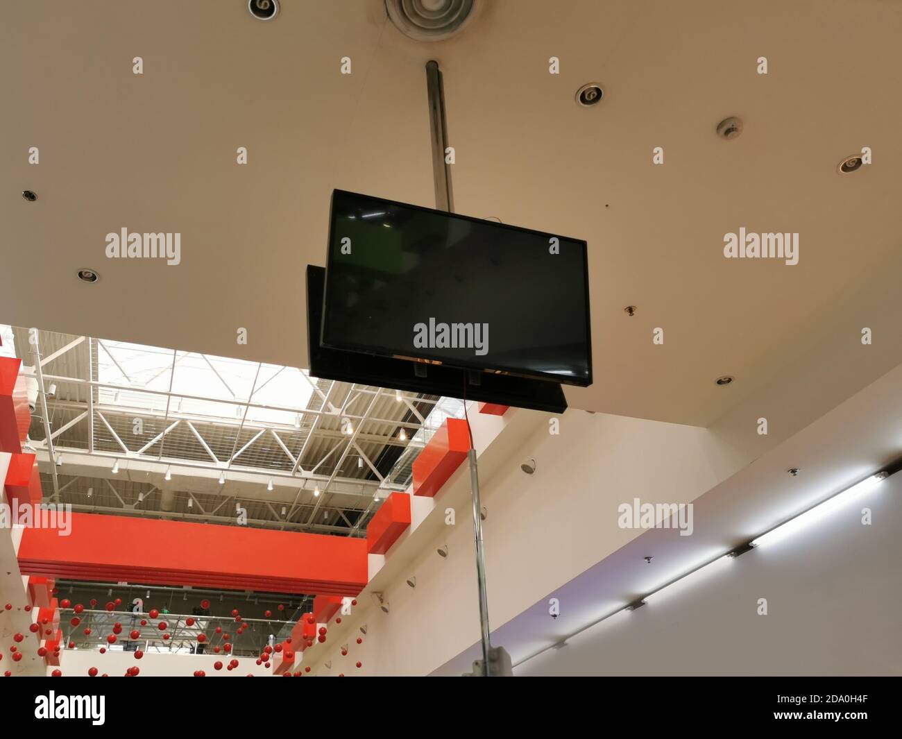 LCD TV with empty copy space, ceiling monitor Stock Photo - Alamy