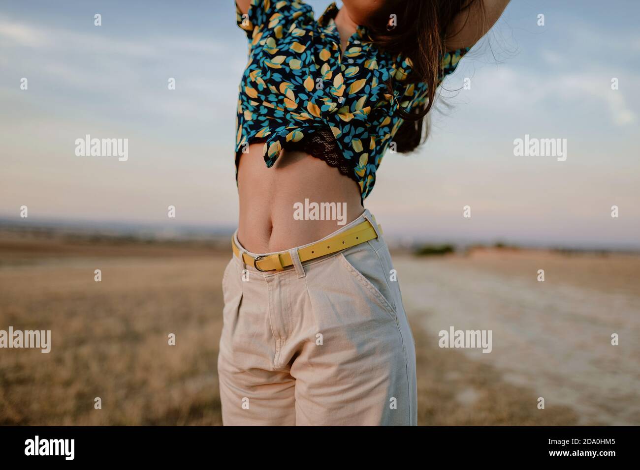 Through cave hole view of content male demonstrating middle fingers ...