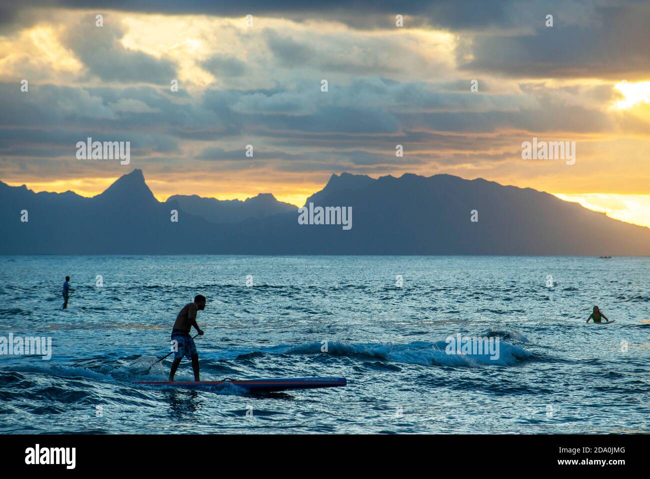 Surfers at Beach with black sand on Pointe Venus, Tahiti, French ...