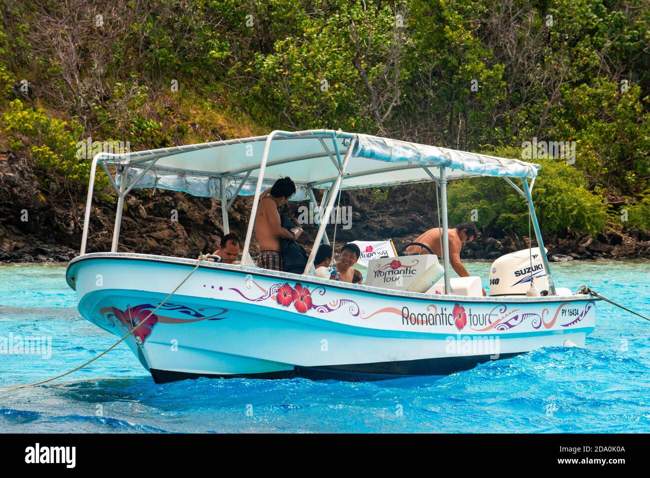 An outrigger boat used for reef excursions in Bora Bora, French ...