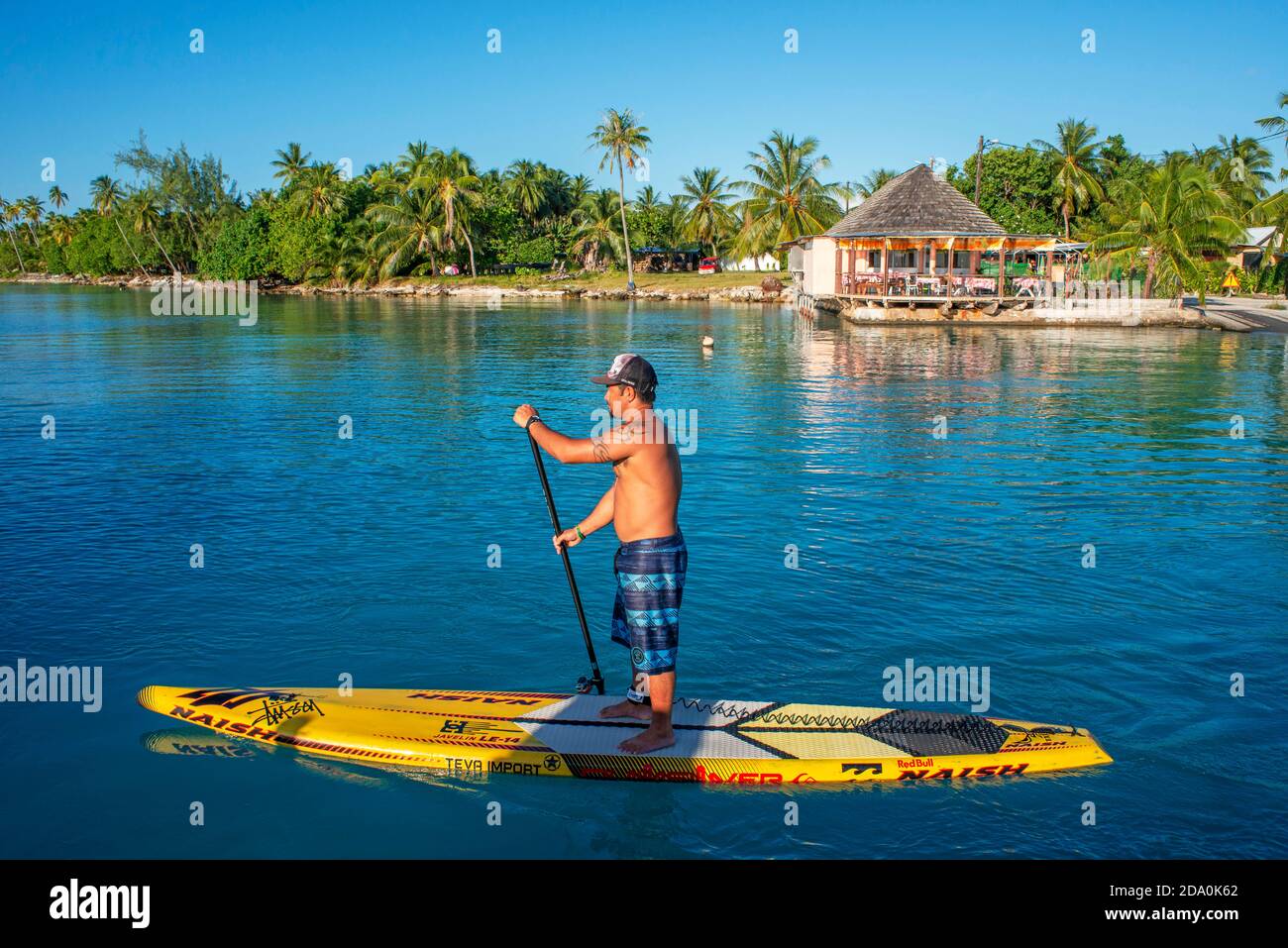 Paddle surf in the beach of Rangiroa, Tuamotu Islands, French Polynesia ...